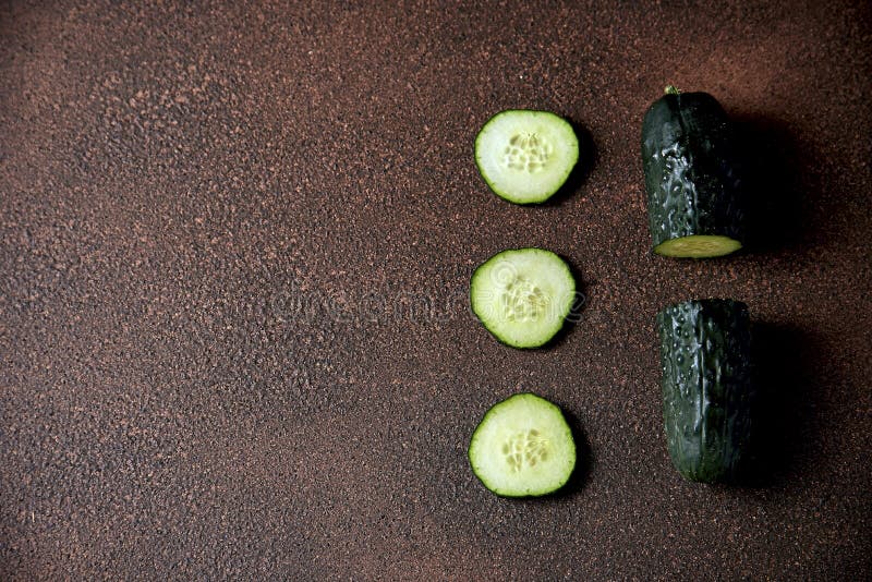 Sliced cucumber on a table stock photo. Image of closeup - 194151148