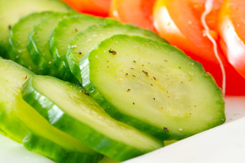 Sliced Cucumbers on the Plate Stock Photo - Image of kitchen, piece ...