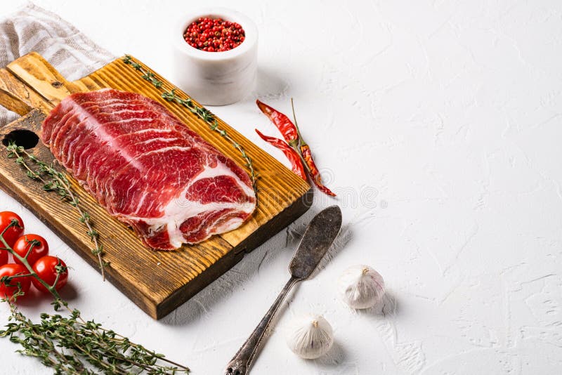 Sliced Cured Coppa Ham, on White Stone Table Background, with Copy ...