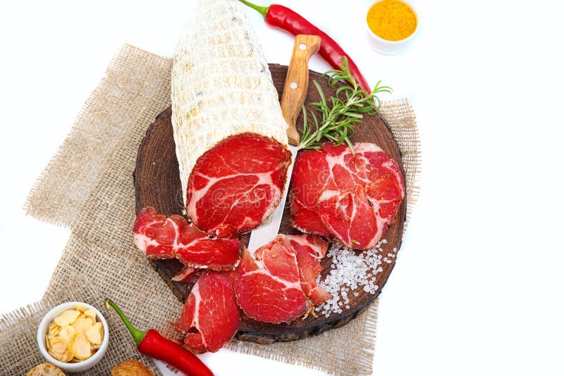 Sliced Cured Coppa with a Sprig of Rosemary. Stock Photo - Image of ...