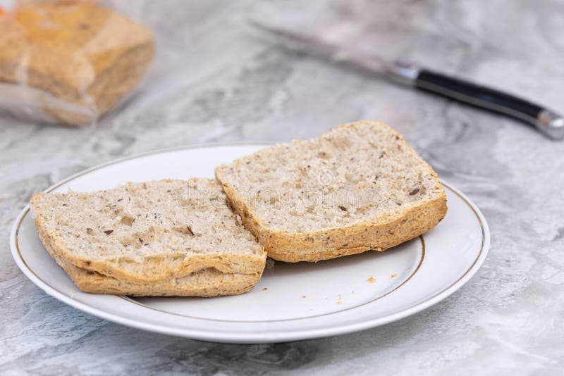 Sliced Dark Bread Served on the Plate Stock Photo - Image of pastry ...