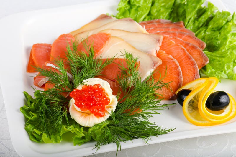 Sliced fish assortment stock photo. Image of meal, plate - 123412792