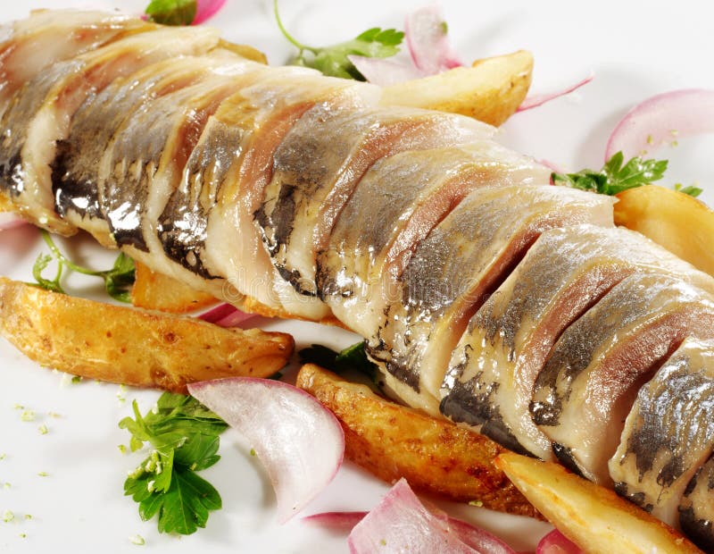Sliced Fish with Baked Potatoes Stock Image - Image of fish, pepper ...
