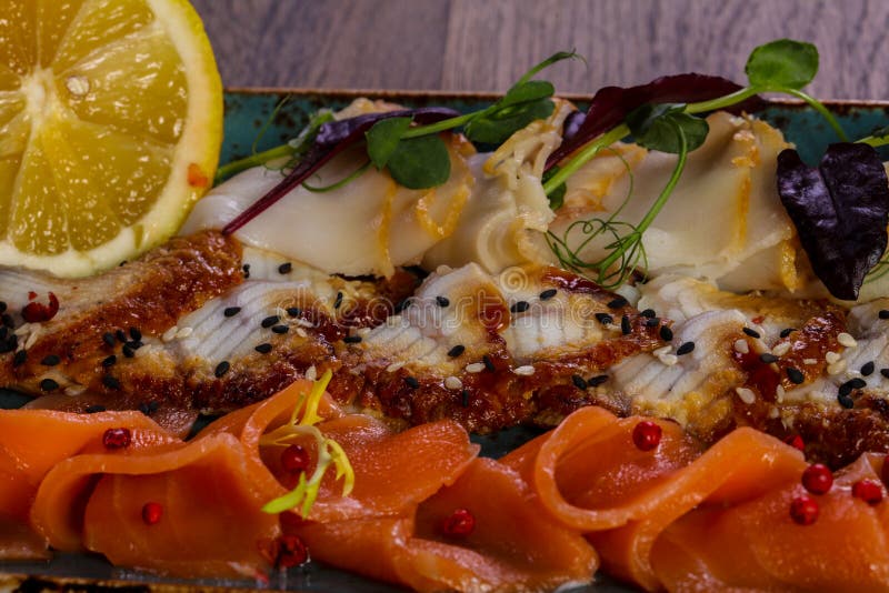 Sliced fish plate stock image. Image of delicacy, delicious - 127927643