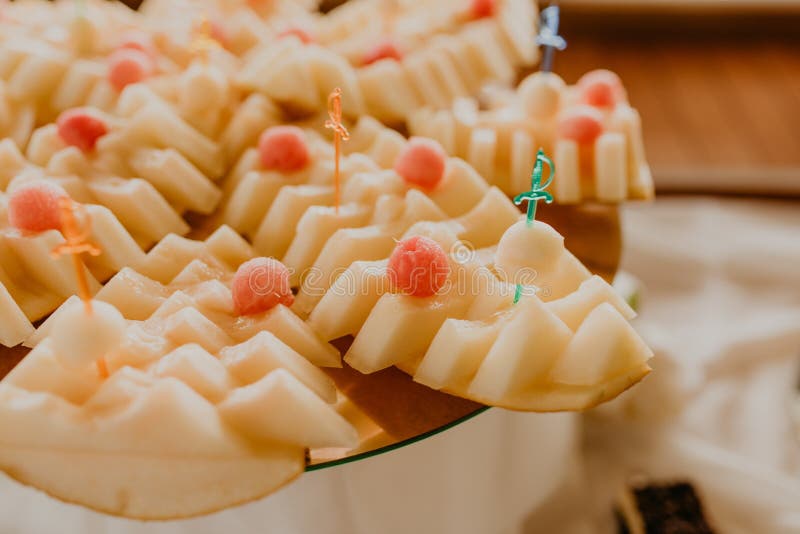Sliced Fresh Melon on a Plate for a Buffet Table Stock Photo - Image of ...