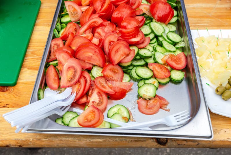 Fresh Tomatoes and Cucumbers Lie on a Tray Stock Photo - Image of ...