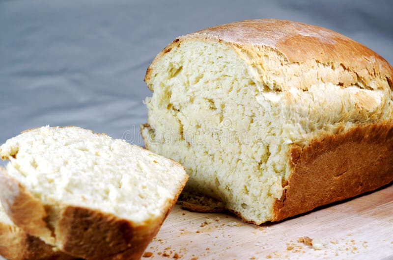 A Sliced, Freshly Baked Loaf of Bread. Stock Photo - Image of ...