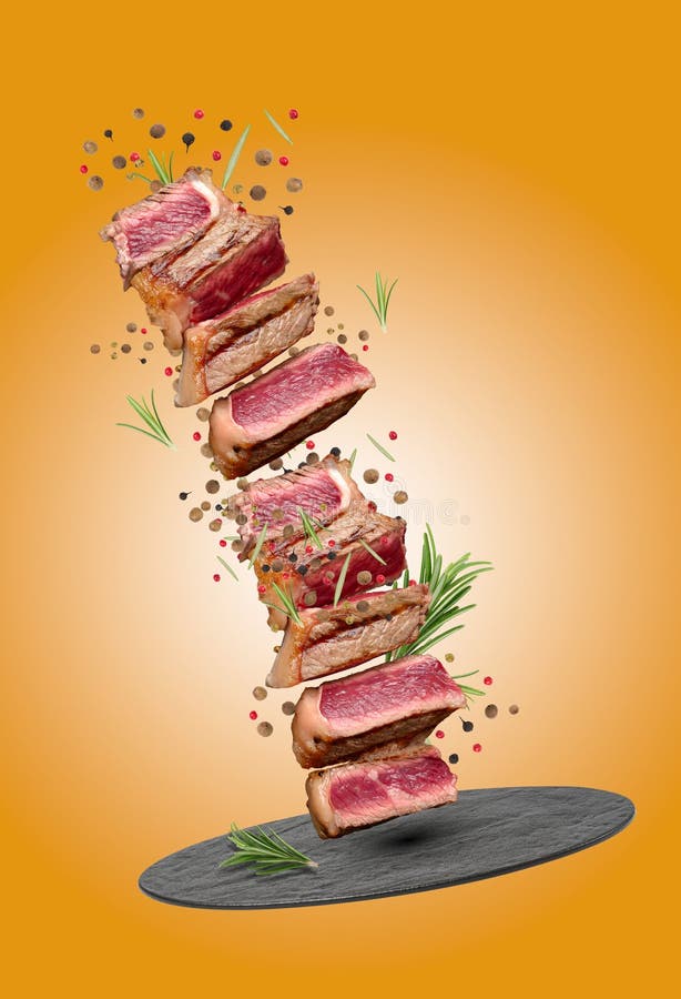 Sliced Fried Beef Steak New York With Spices And A Sprig Of Rosemary Degree Of Doneness Rare