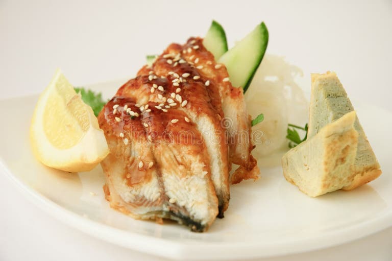 Sliced fried fish (eel) stock photo. Image of isolated - 10764434