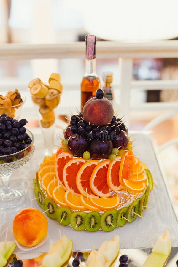 Sliced Fruits Make Tired Cake Served on the White Plate Stock Image ...