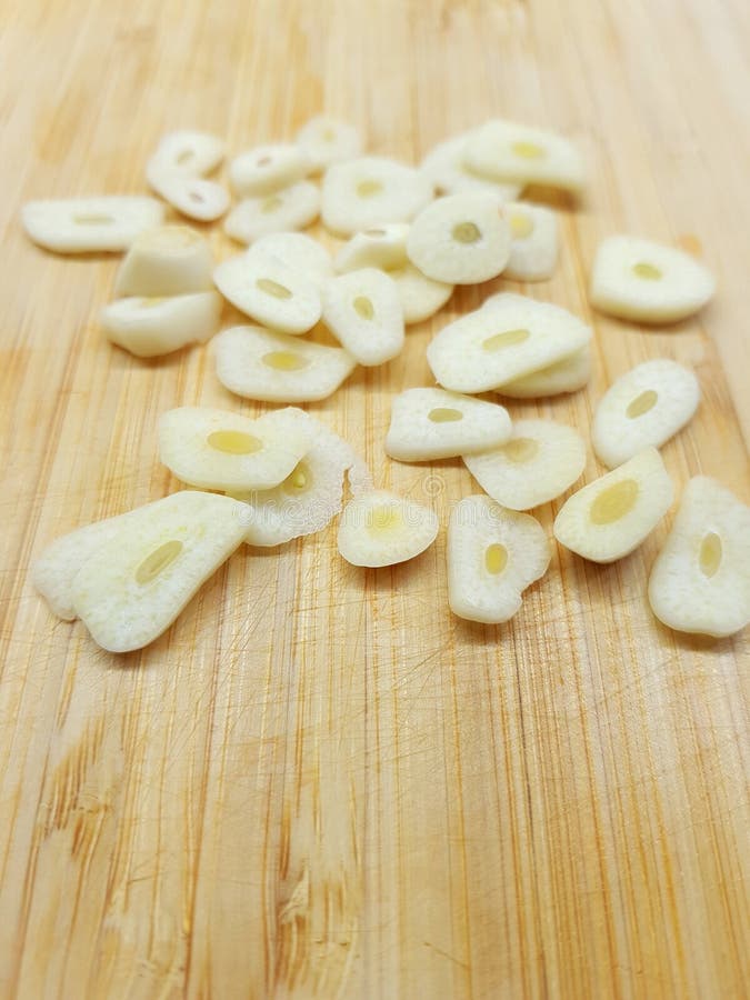 Sliced garlic and onion stock photo. Image of garlic - 115448382
