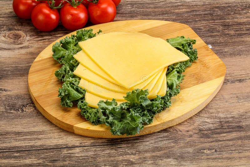 Sliced Gauda Cheese Over Board Stock Image - Image of gauda, swiss ...