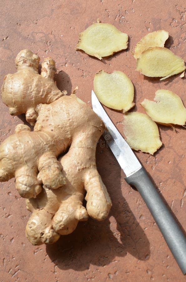 Sliced ginger root stock photo. Image of background, knife - 90765174