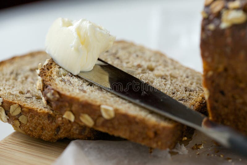 Sliced Grain Bread with Butter Side View Stock Image - Image of bran ...