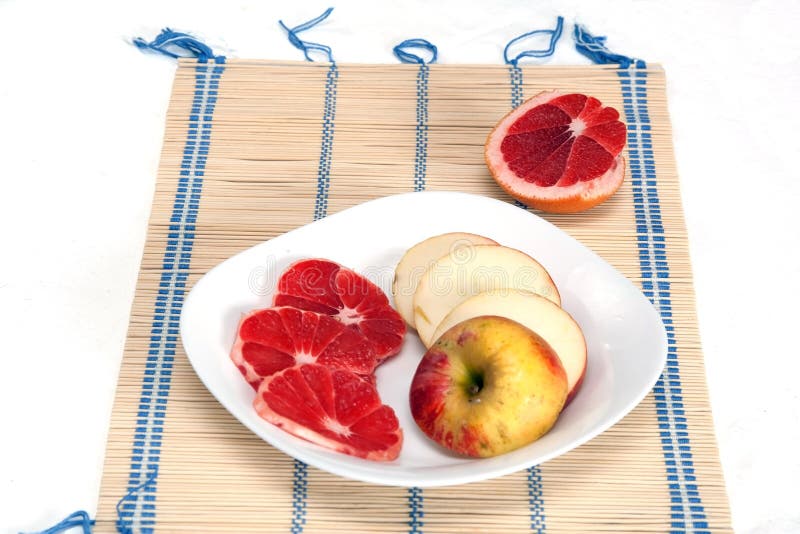 Sliced Grapefruit and Apple Stock Photo - Image of slices, dessert ...
