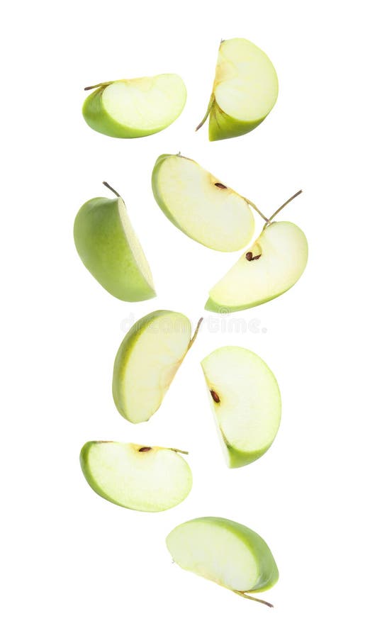 Sliced Green Apples in Air on White Background Stock Photo - Image of ...