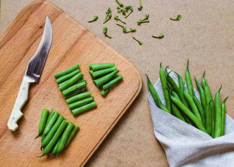 Sliced Green Beans and a Bunch of Green Beans on the Table Stock Photo ...
