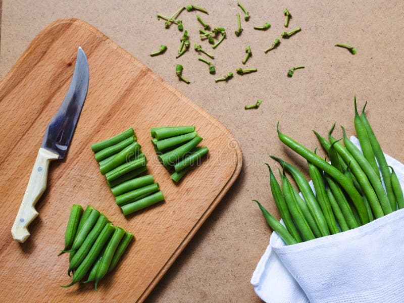Sliced Green Beans and a Bunch of Green Beans on the Table Stock Photo ...