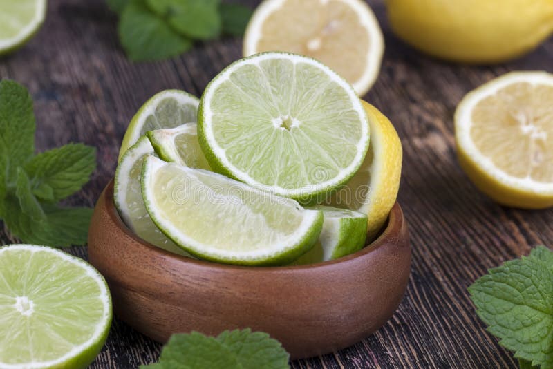 Sliced Green Lime and Yellow Lemon Stock Image - Image of lime, food ...
