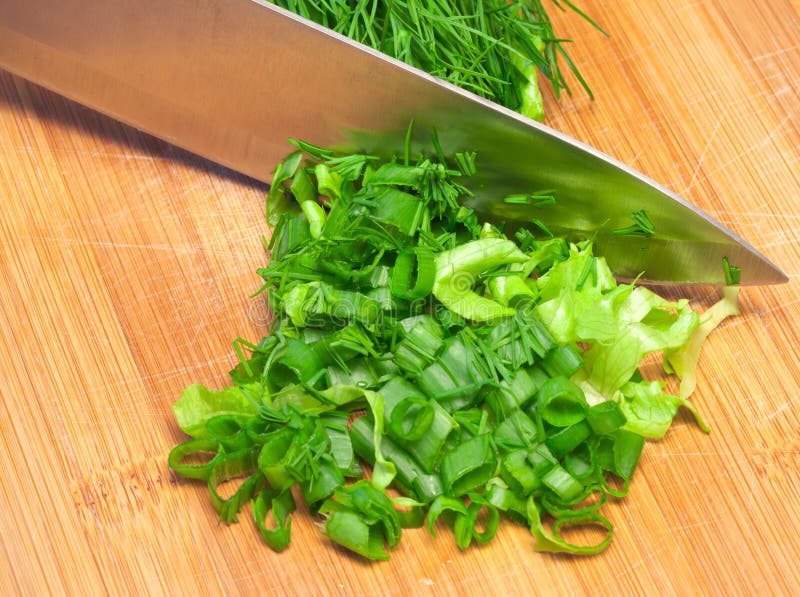 Sliced greens with knife stock image. Image of closeup - 25587341