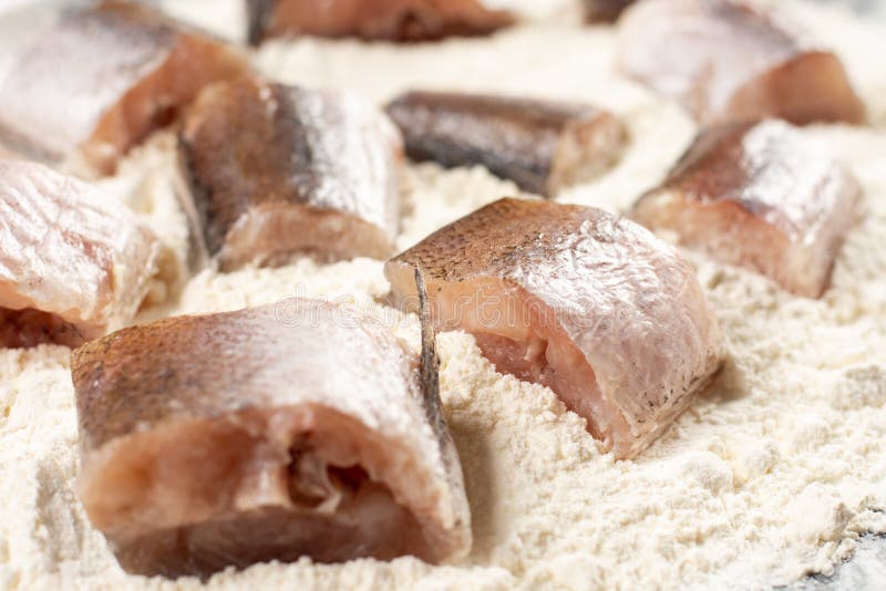 Sliced Hake in the Flour Prepared for Frying Stock Photo - Image of ...