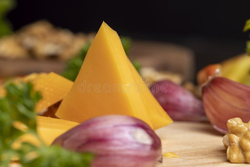 Sliced Hard Cheese Made from Milk Stock Photo - Image of slice, portion ...
