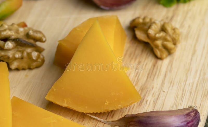 Sliced Hard Cheese Made from Milk Stock Photo - Image of cook, food ...