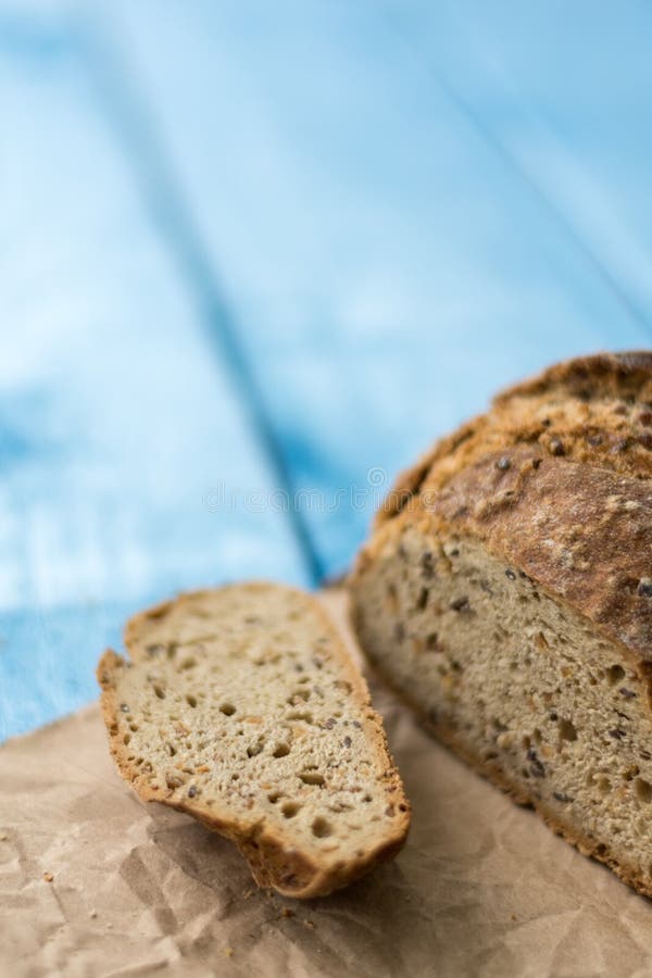 Sliced Healthy Round Black Bread on the Table with Knife Stock Image ...