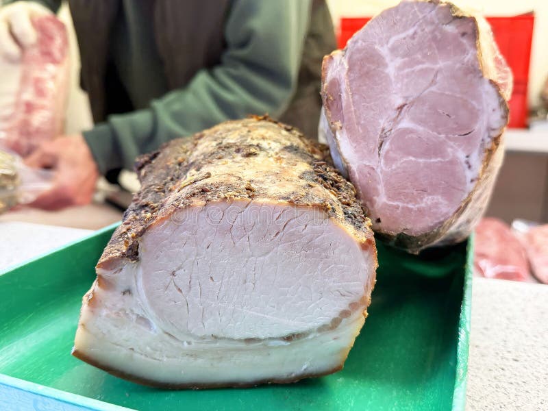 Sliced Homemade Bacon on Green Tray in Market Setting, Supermarket ...