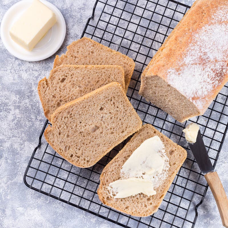 Sliced Homemade Sandwich Bread with Butter, on Cooling Rack, Top View ...