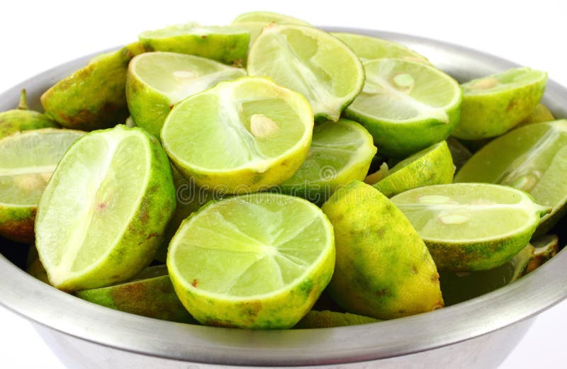 Sliced key limes stock image. Image of bowl, juicy, rind - 16037277
