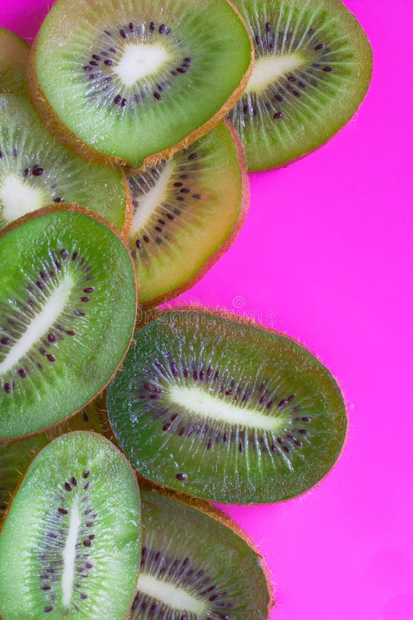 Kiwi with pink background stock photo. Image of saludable - 182866556
