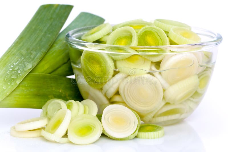 Sliced leek in glass bowl stock photo. Image of bowl - 13795546
