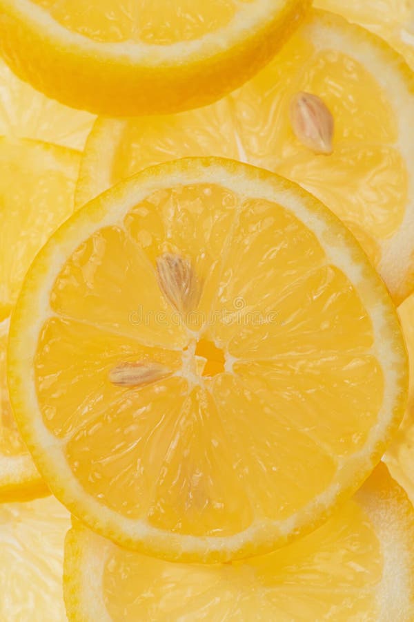 Sliced Lemon As a Background Vertical Photo. Citrus, Lemon Stock Photo ...