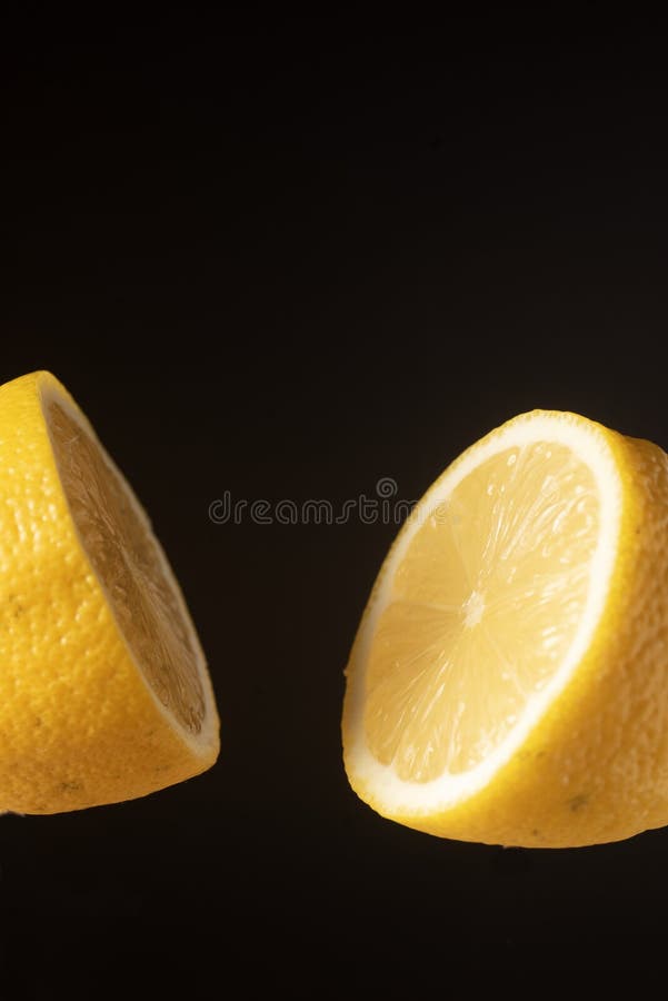 Sliced lemon floating stock image. Image of healthy - 187470029