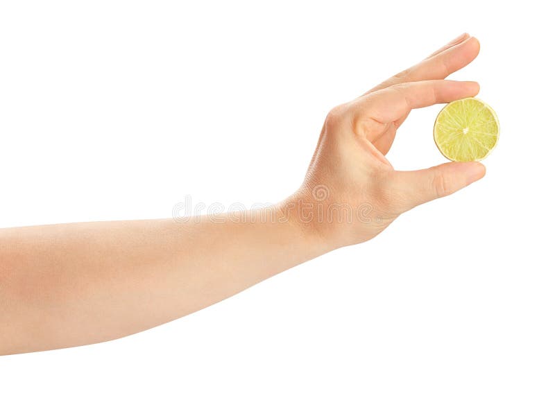 Sliced lime in hand stock image. Image of hand, tasty - 259676795