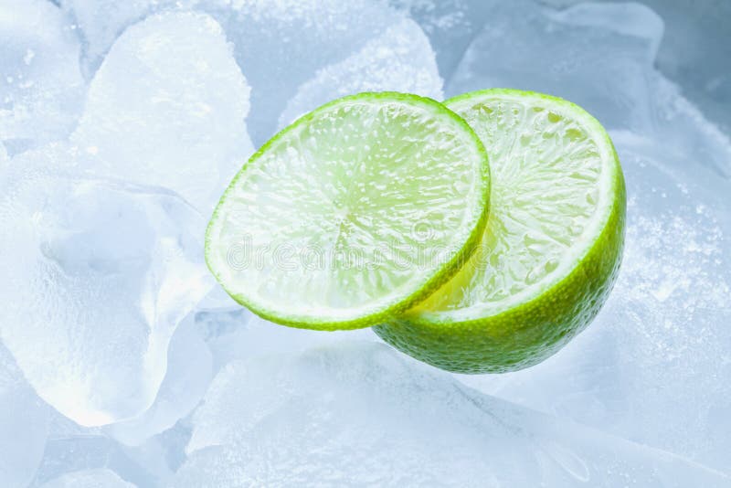 Sliced lime and ice stock image. Image of tropical, white - 74685539