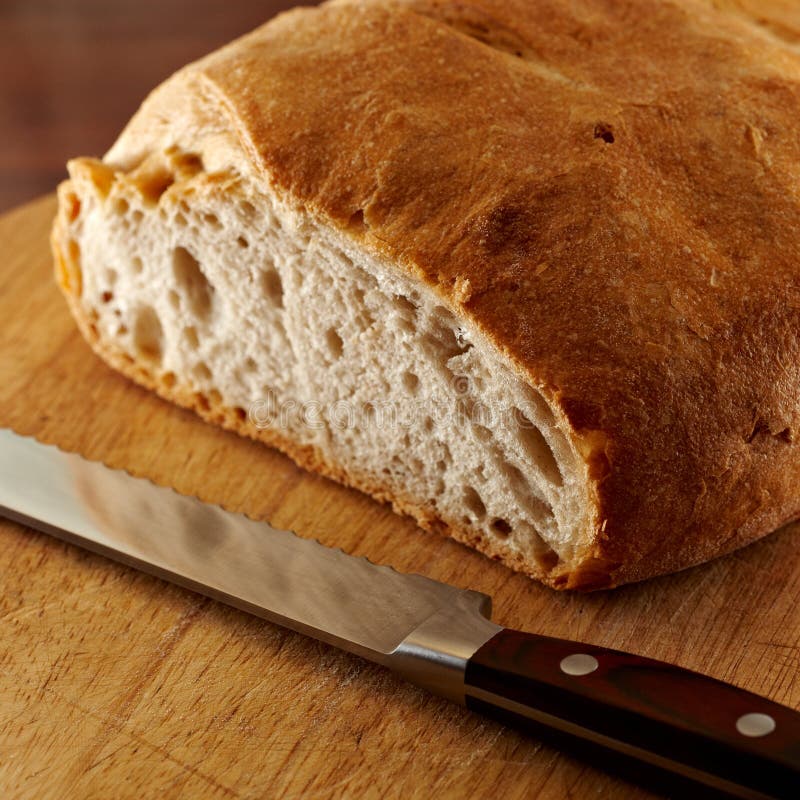 Sliced loaf of fresh bread stock photo. Image of freshness - 12109580