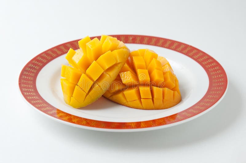 Sliced mango in a plate stock image. Image of exotic - 32591767
