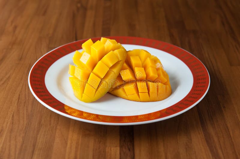 Sliced mango in a plate stock image. Image of exotic - 32591767