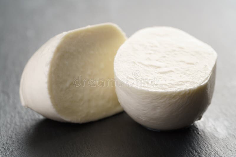 Sliced Mozarella Ball on Slate Background Stock Photo - Image of fresh ...
