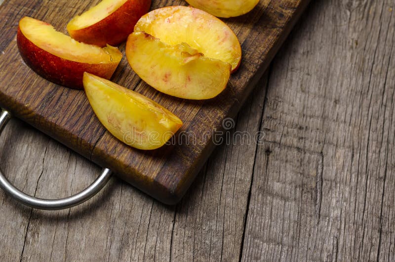 Sliced Nectarine on Wooden Cutting Board Stock Image - Image of dessert ...