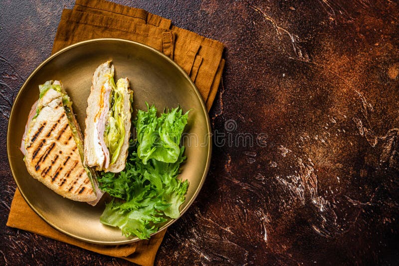 Sliced Panini with Ham, Salad and Cheese. Dark Background. Top View ...