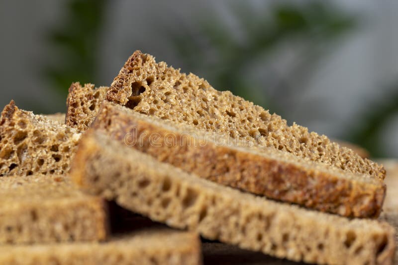 Sliced Piece of Black Rye Bread on a Board Stock Photo - Image of taste ...