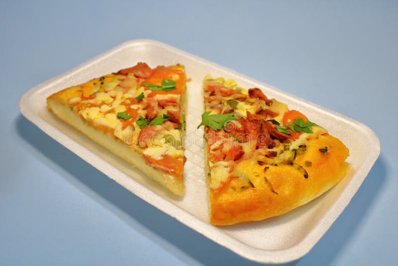 Sliced Pieces of Pizza in Plastic Packaging on the Table. Stock Image ...