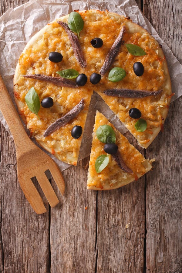 Sliced Pizza with Anchovies and Onions. Vertical Top View Stock Photo ... Sliced Pizza with Anchovies and Onions. Vertical Top View Stock Photo ...