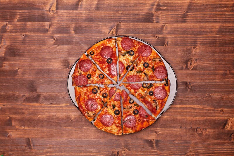 Sliced Pizza on Baking Pan - Top View Stock Photo - Image of preparing ...