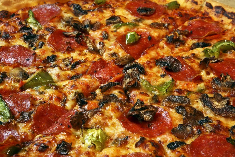 Sliced Pizza Closeup stock photo. Image of gourmet, crispy - 7775384