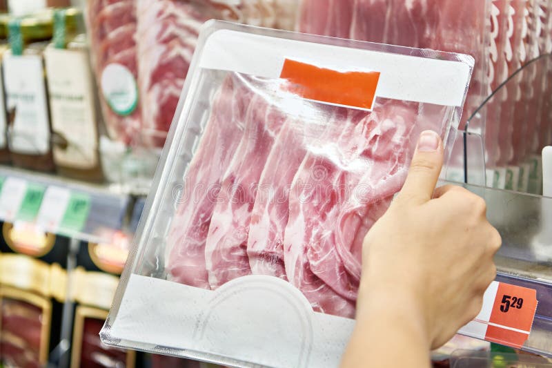 Sliced Prosciutto Meat in Package in Hand Stock Image - Image of ...