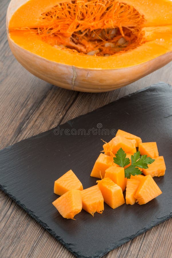 Sliced pumpkin stock image. Image of edible, wood, yellow - 41234883